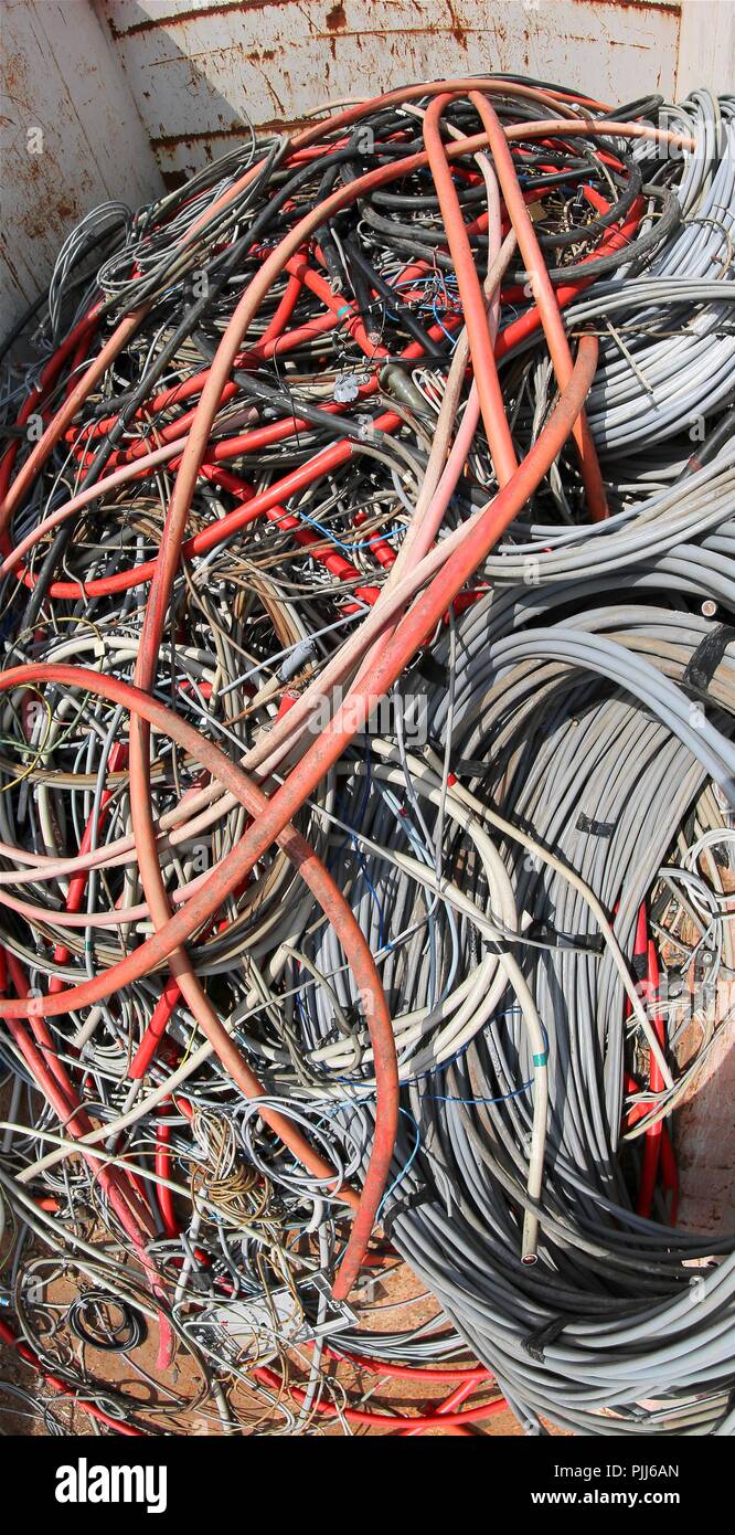long red and gray electric cables in a large container Stock Photo - Alamy