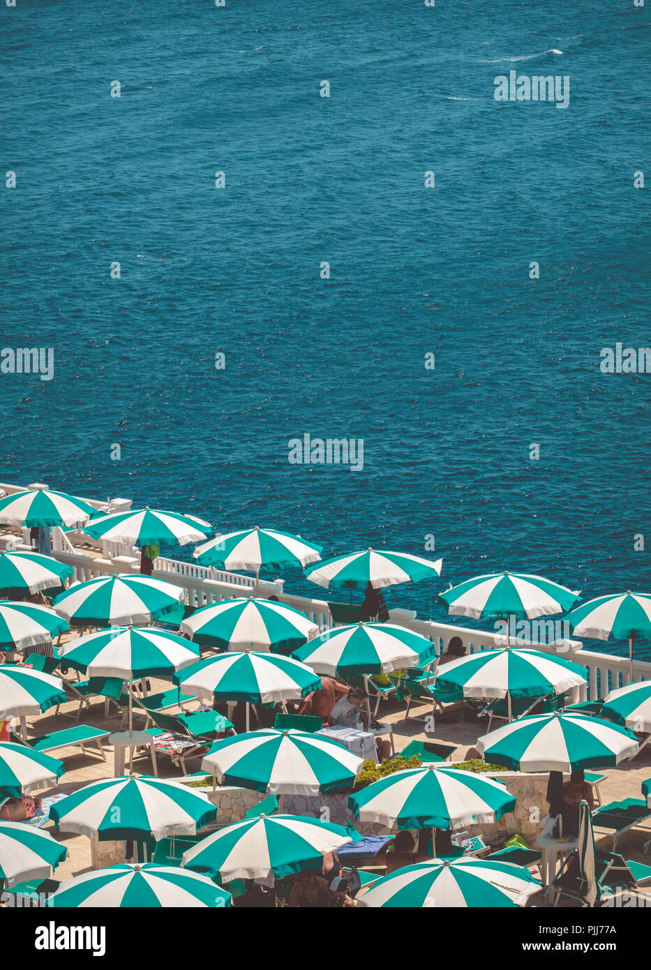 Retro parasol hi-res stock photography and images - Alamy