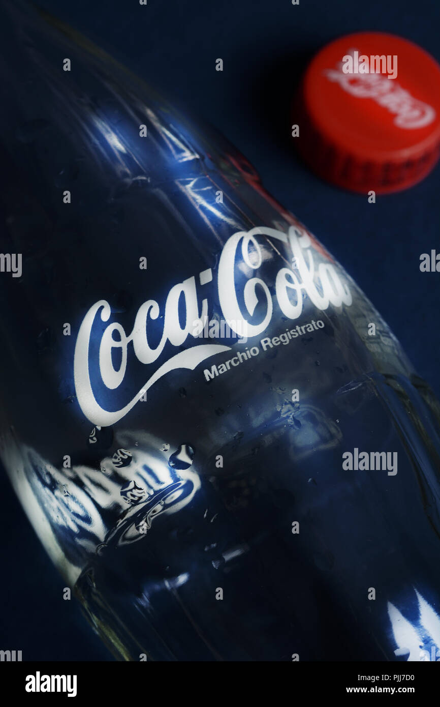 Coca-Cola glass bottle - produced in Italy - editorial use only ...
