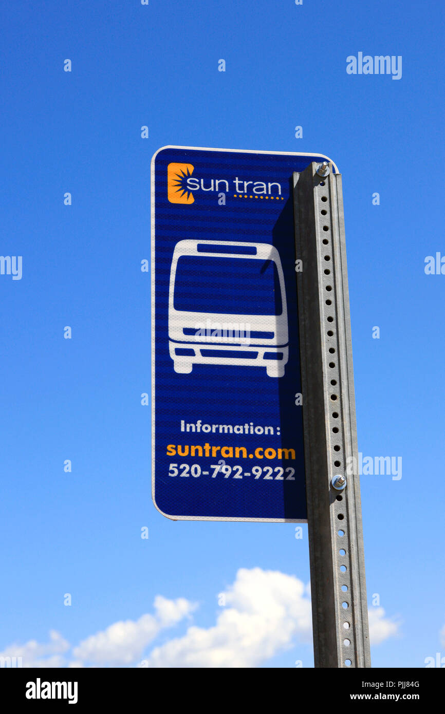 SunTran public transport bus stop sign on the sidewalk in Tucson, AZ ...