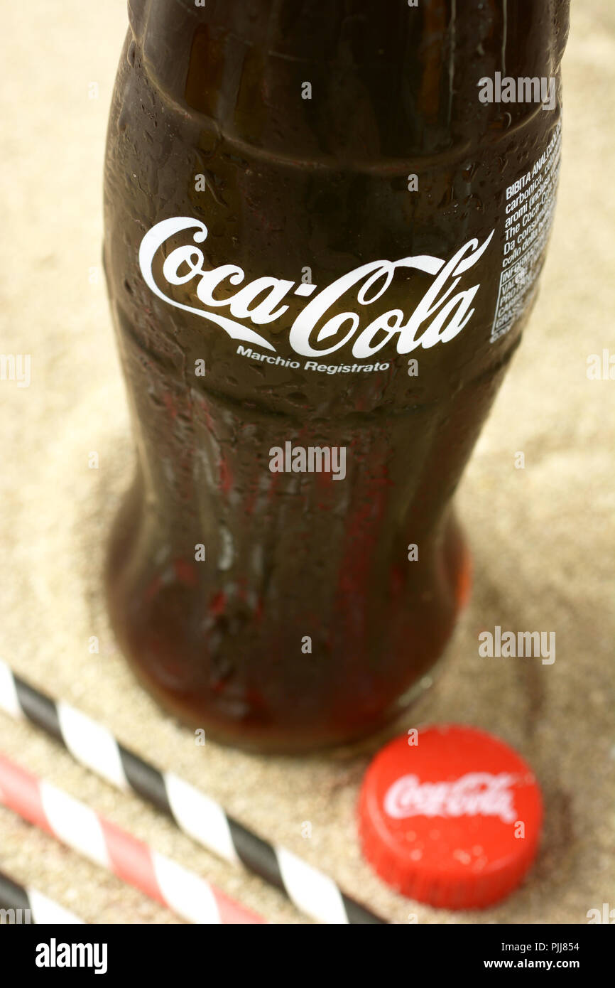 Coca-Cola glass bottle - produced in Italy - editorial use only ...