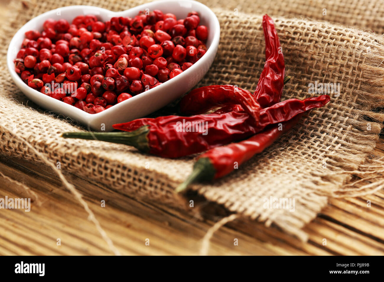 red hot bird chili pepper nature background with pepper corns Stock ...