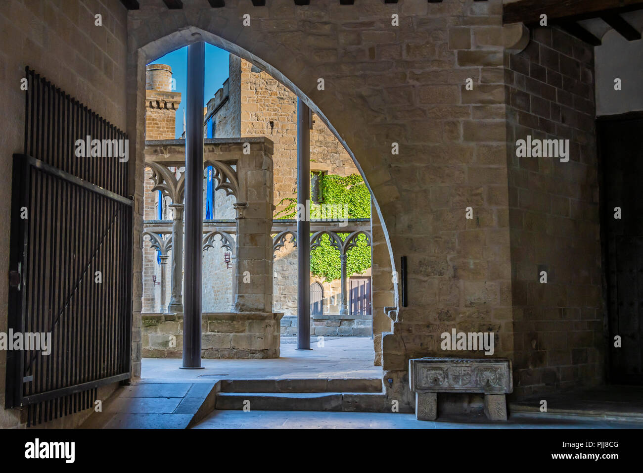 Passage and old buildings medieval town of Olite in the background you ...
