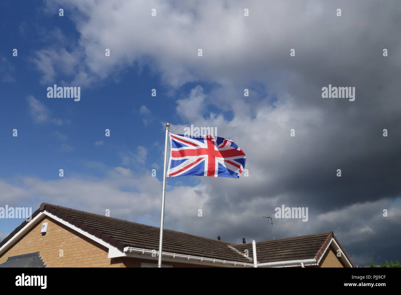 St George's English Flag flying fully open in the wind Stock Photo - Alamy