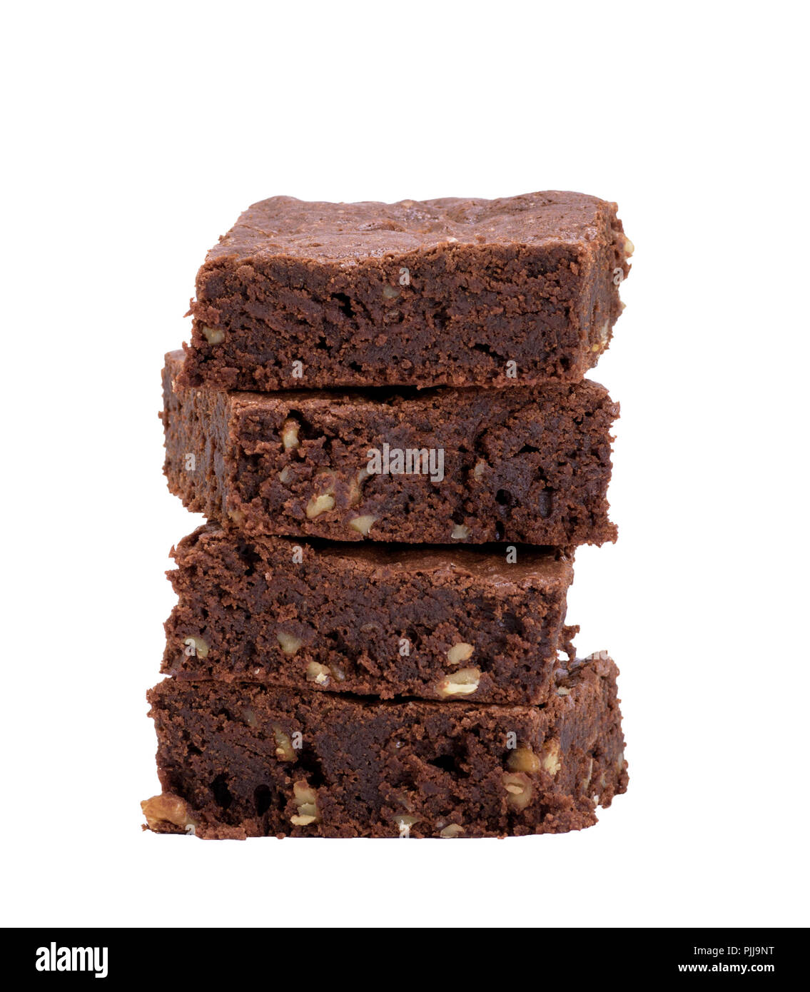 stack of square baked pieces of chocolate brownie pie with walnuts ...