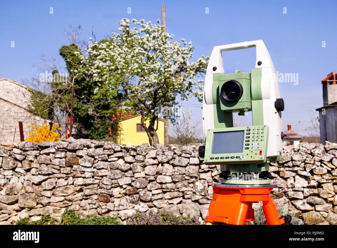 Total station. Survey Instrument geodetic device, total station set in ...