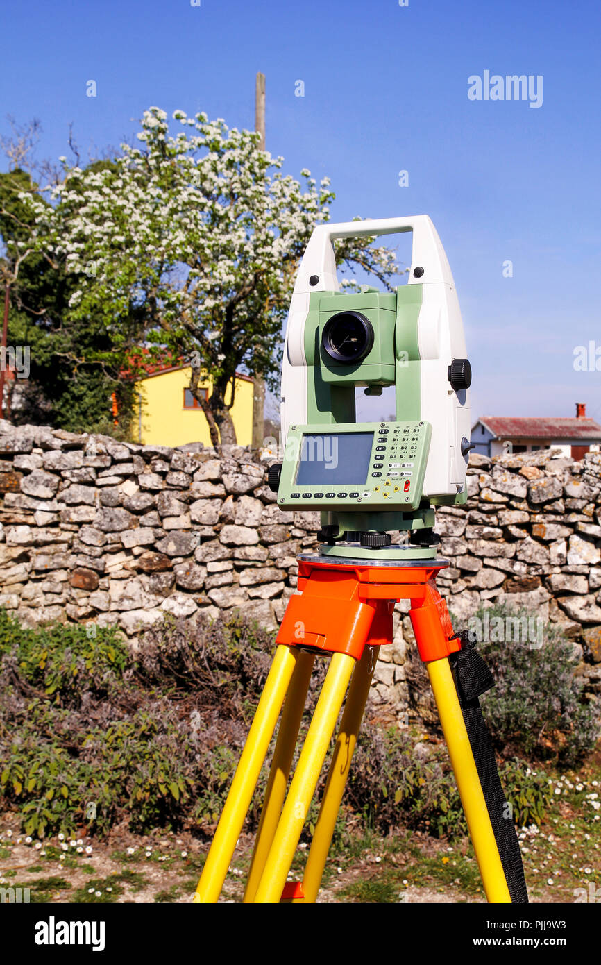 Total station. Survey Instrument geodetic device, total station set in ...