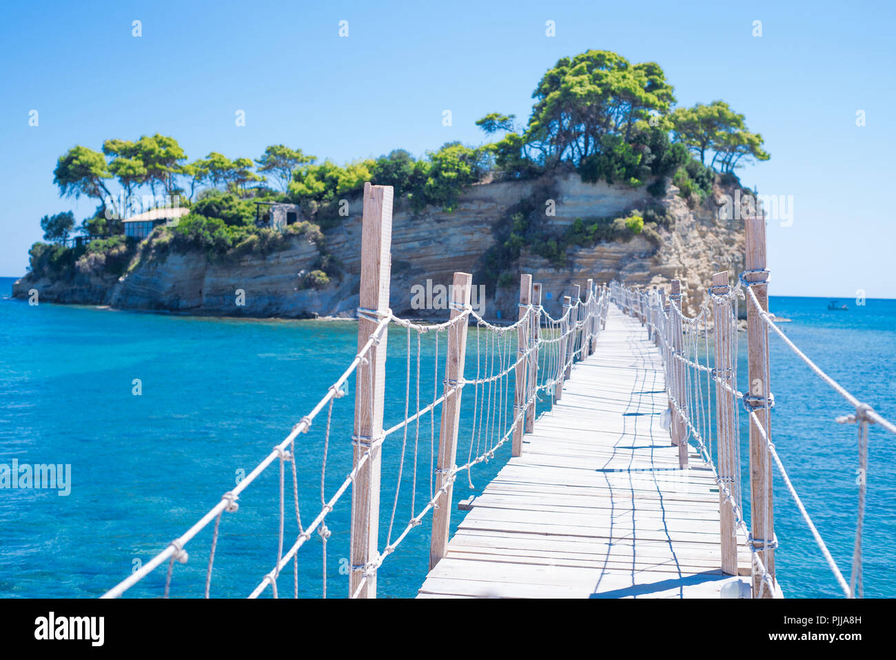 Wooden bridge on the small island of Cameo in Greece Stock Photo - Alamy