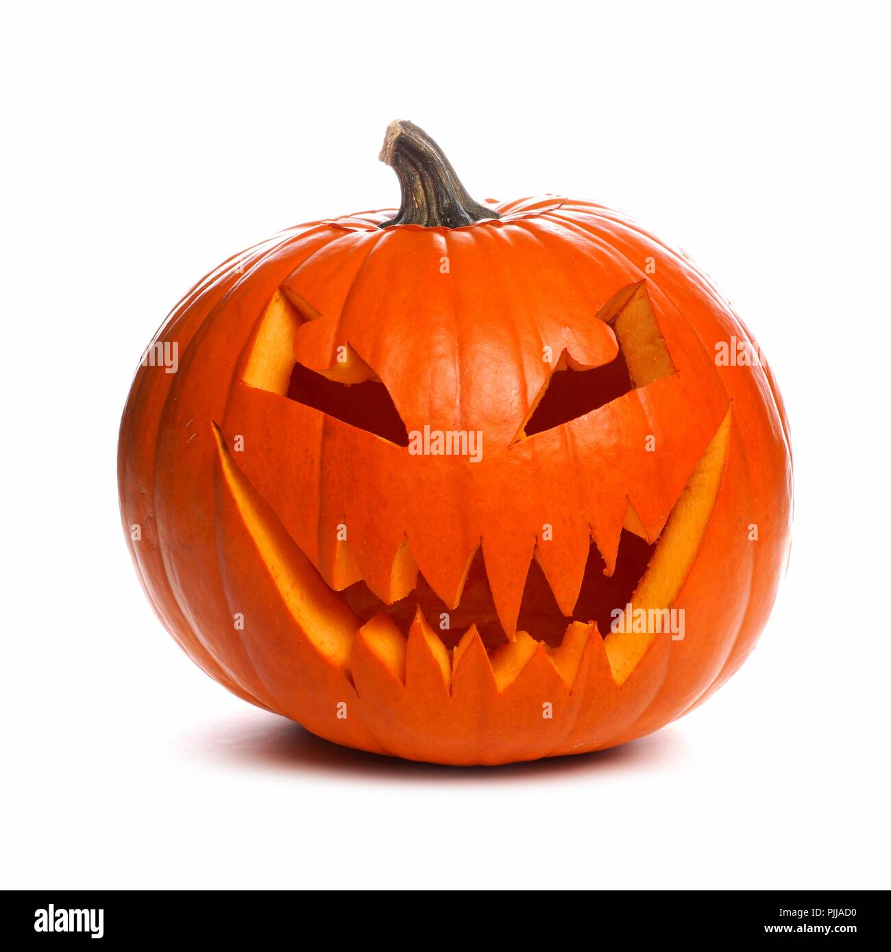 Spooky Halloween Jack o Lantern isolated on a white background Stock ...