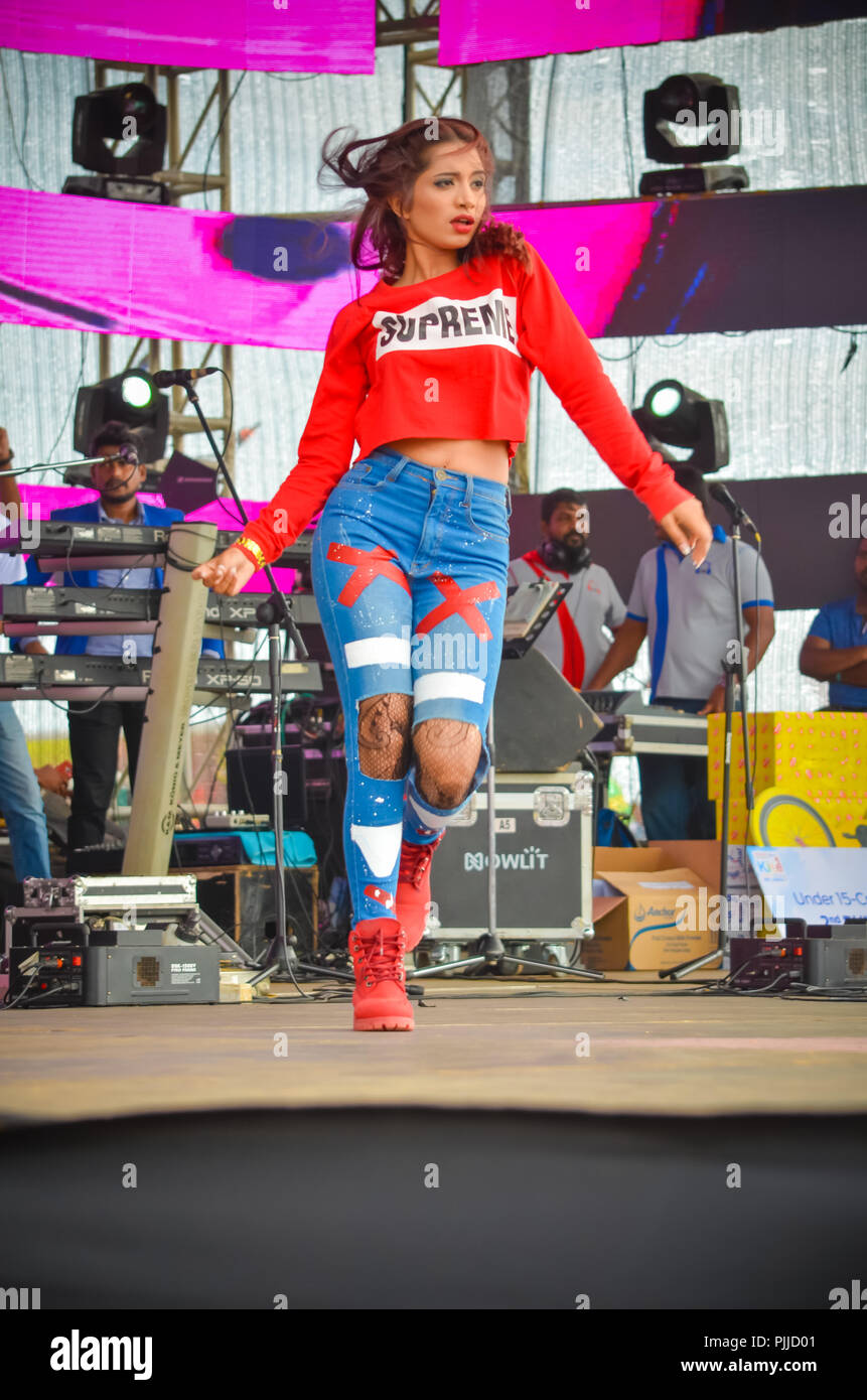 Girl dancing at the concert Stock Photo - Alamy