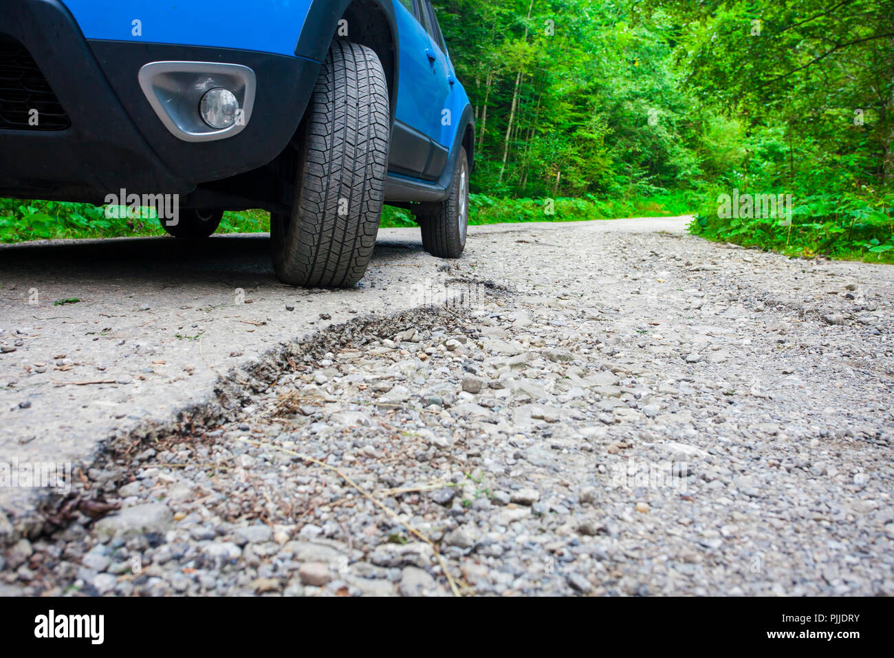 Pot hole damaged wheel hi-res stock photography and images - Alamy
