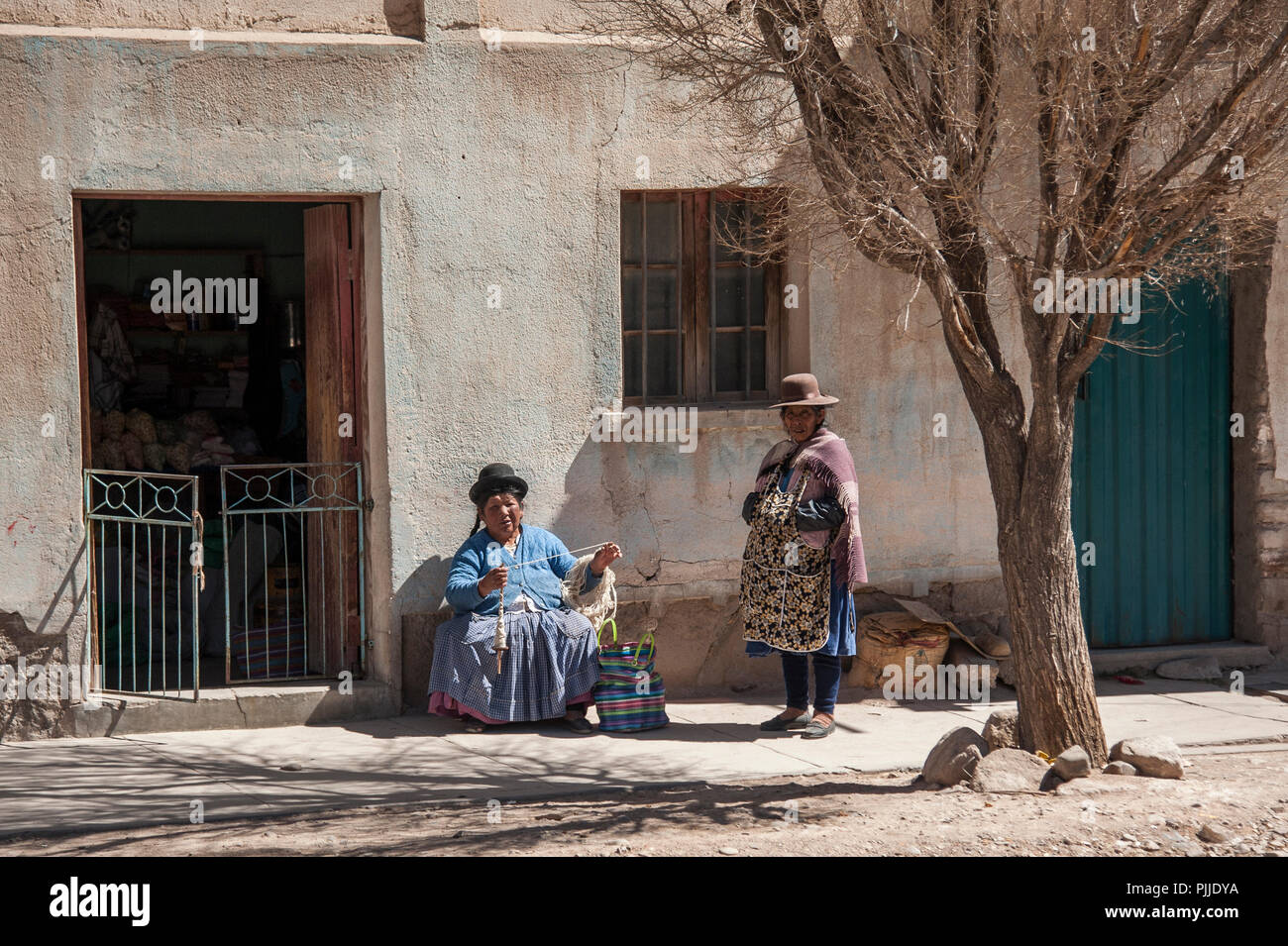 ORURO, BOLIVIA - AUGUST 17, 2017: Bolivian women along the road to ...