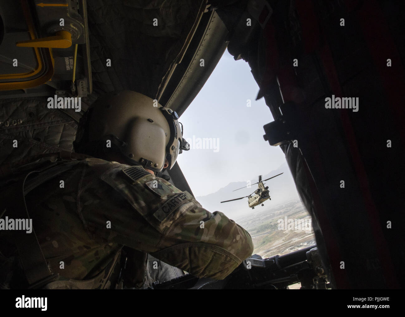 September 6, 2018 - A gunner on the CH-47 Chinook mans the machine gun ...