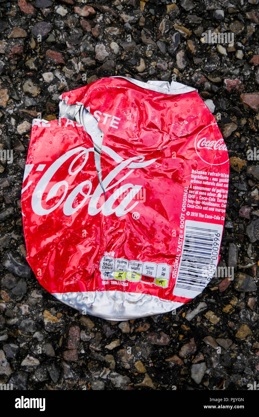 A coca-Cola can crashed on the asphalt, Lyon, France Stock Photo - Alamy