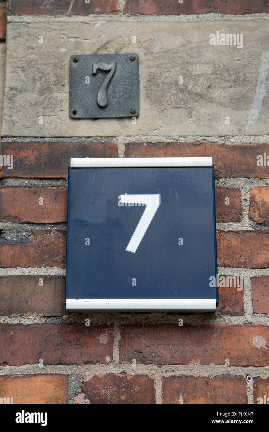 Number Seven on Brick Wall Facade Stock Photo - Alamy
