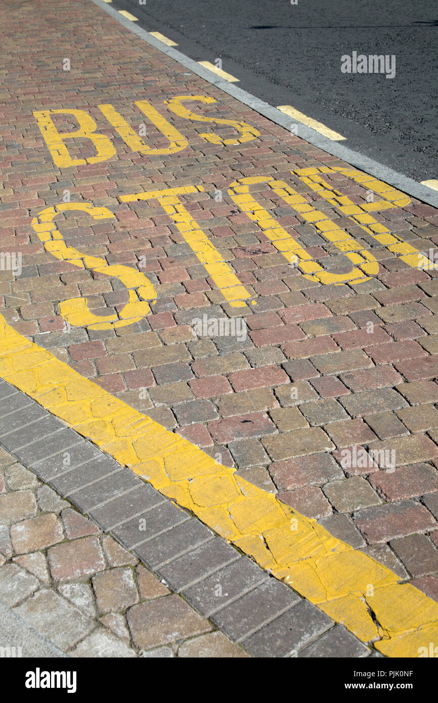 Bus Stop on Road Surface Stock Photo - Alamy