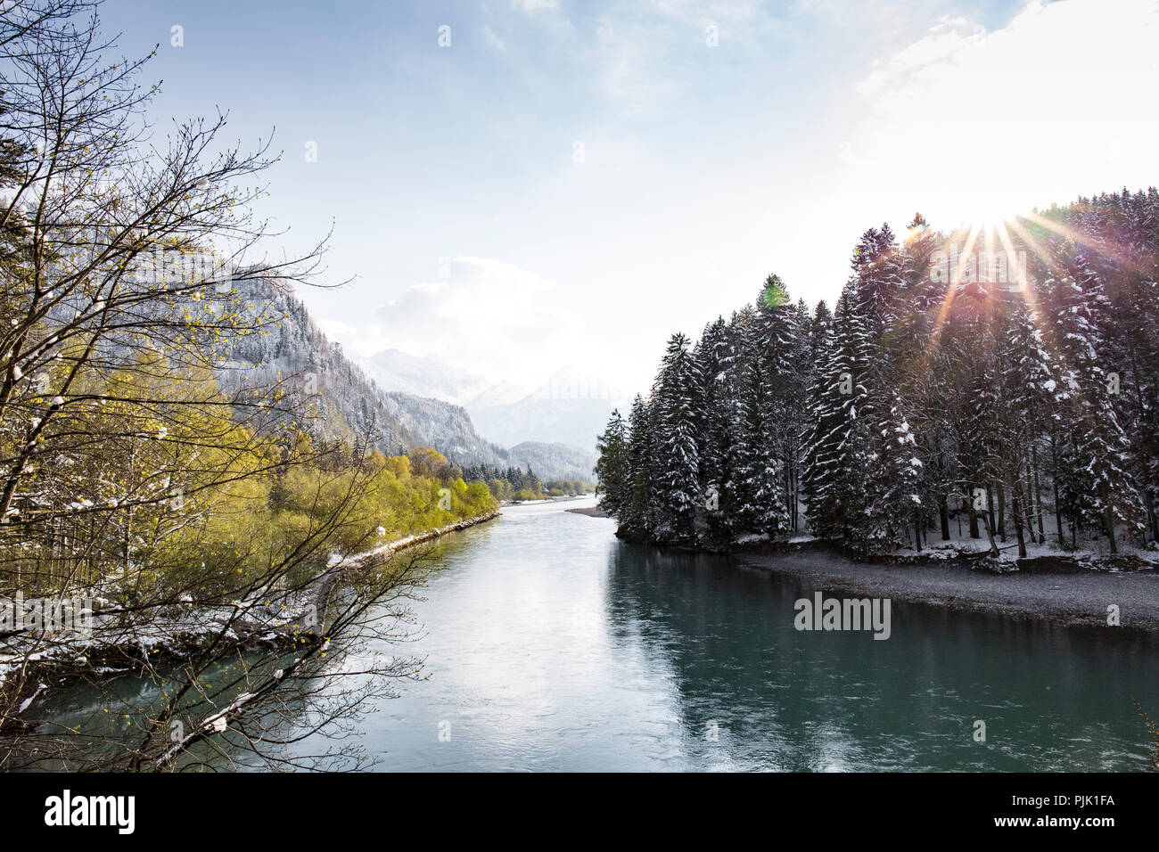 The transition between winter and spring at Lech river in Allgäu region ...