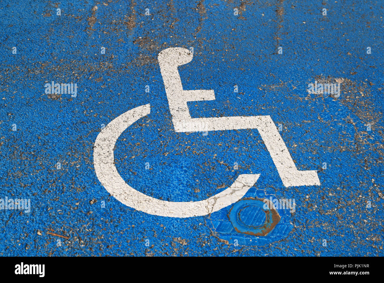 Handicapped sign at asphalt for disabled parking Stock Photo - Alamy