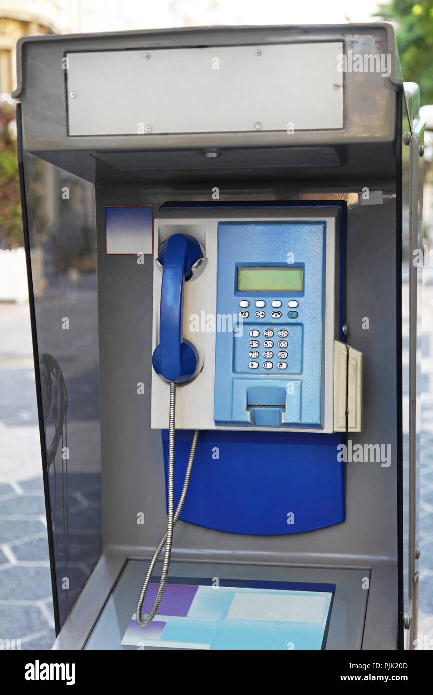 Old style payphone hi-res stock photography and images - Alamy