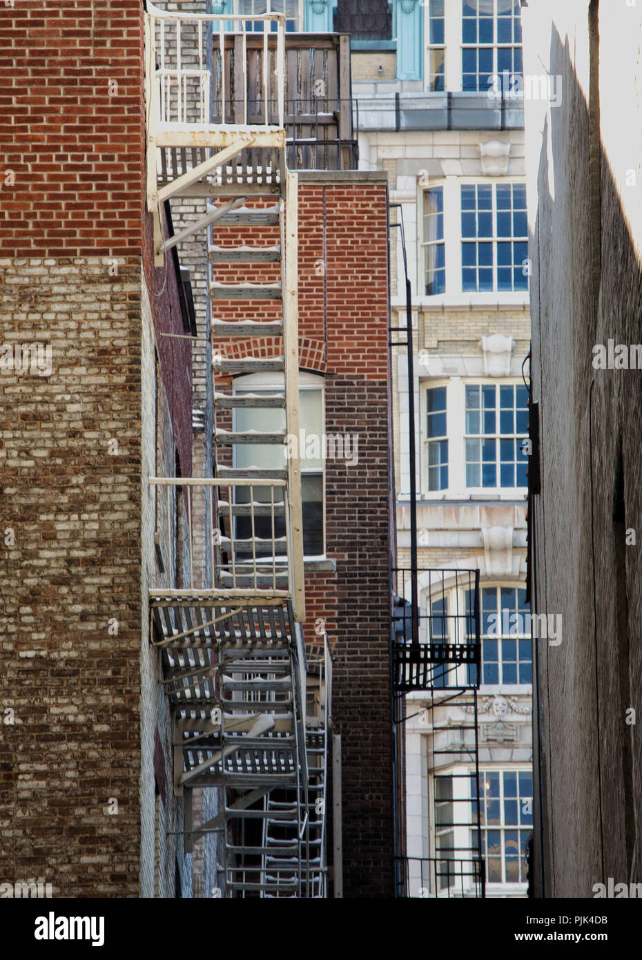 Fire exit stairs on typical New York brick buildings in Manhattan, New ...