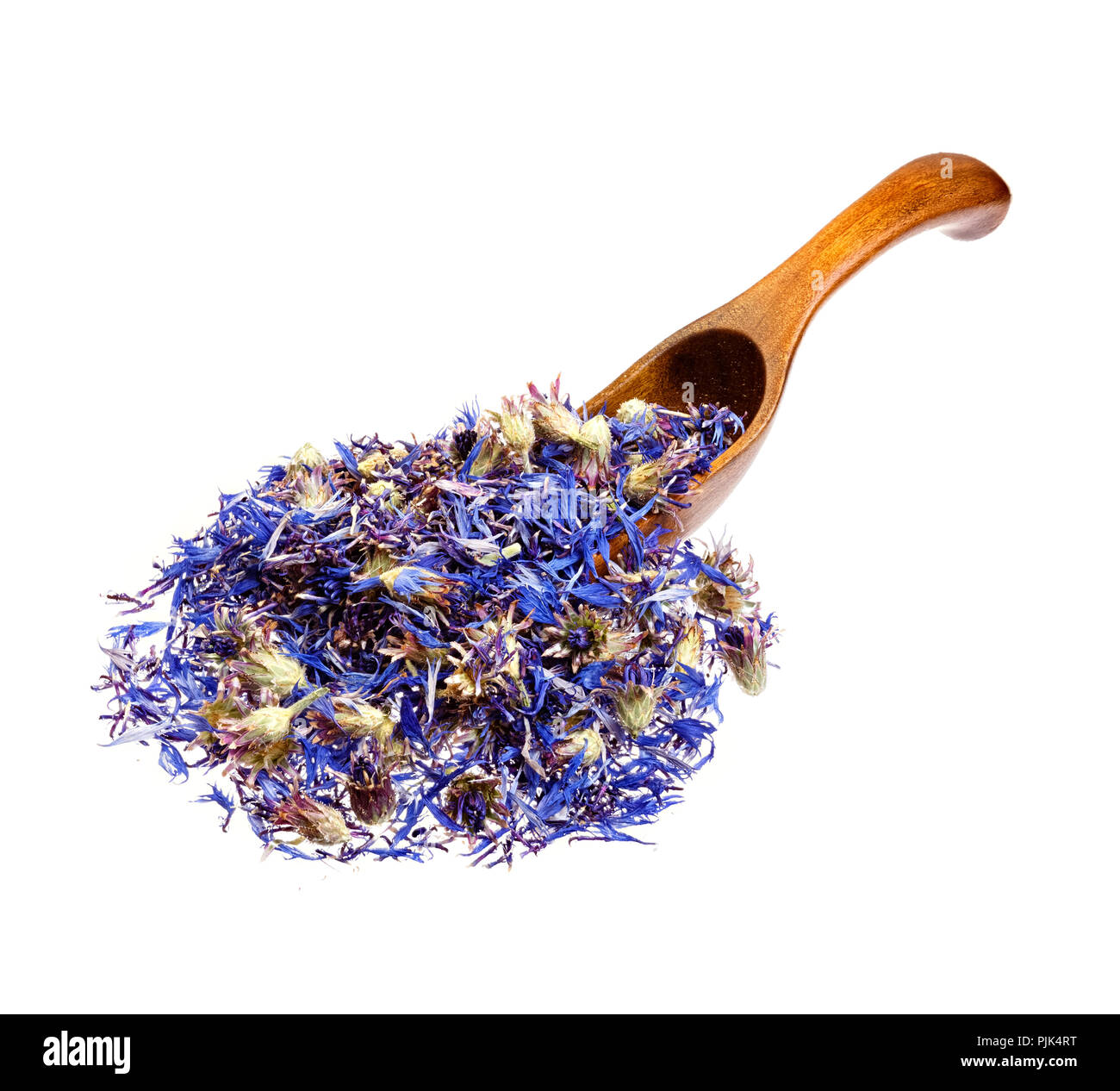 Dried cornflower tea on the wooden spoon. High resolution photo Stock ...