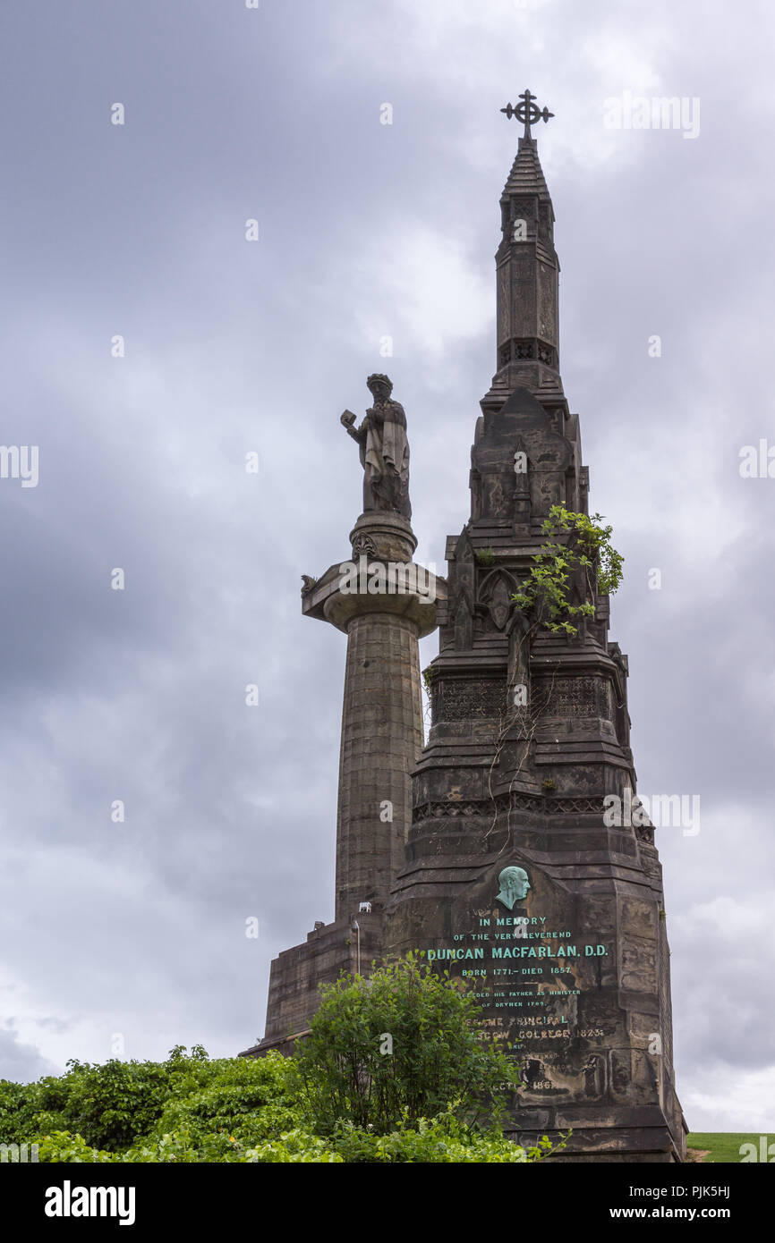 Glasgow, Scotland, UK - June 17, 2012: Necropolis. The two tall brown ...