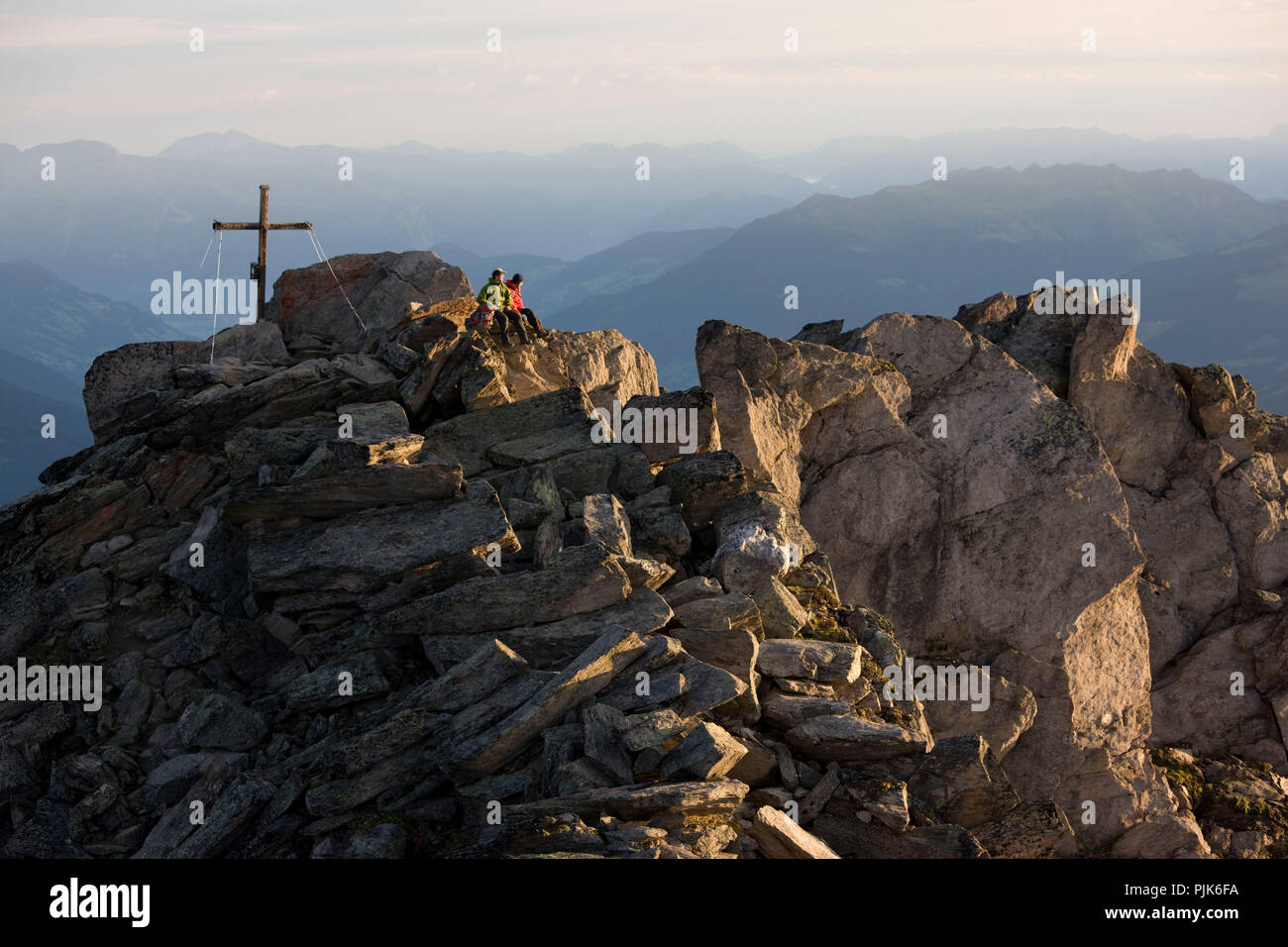Climbers at the summit of the Ahornspitze during sunrise, Zillertal ...