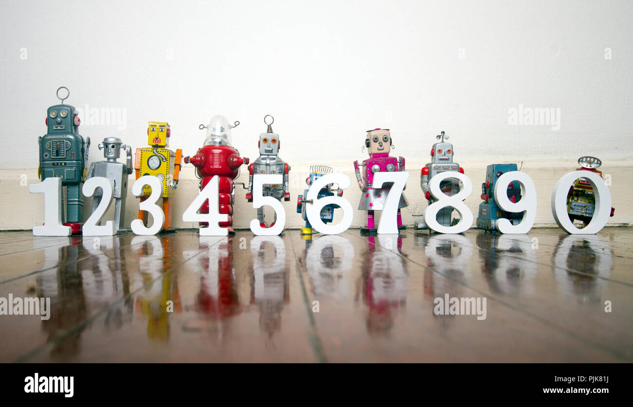 a lin of retro robots with numbers one to 9 Stock Photo - Alamy