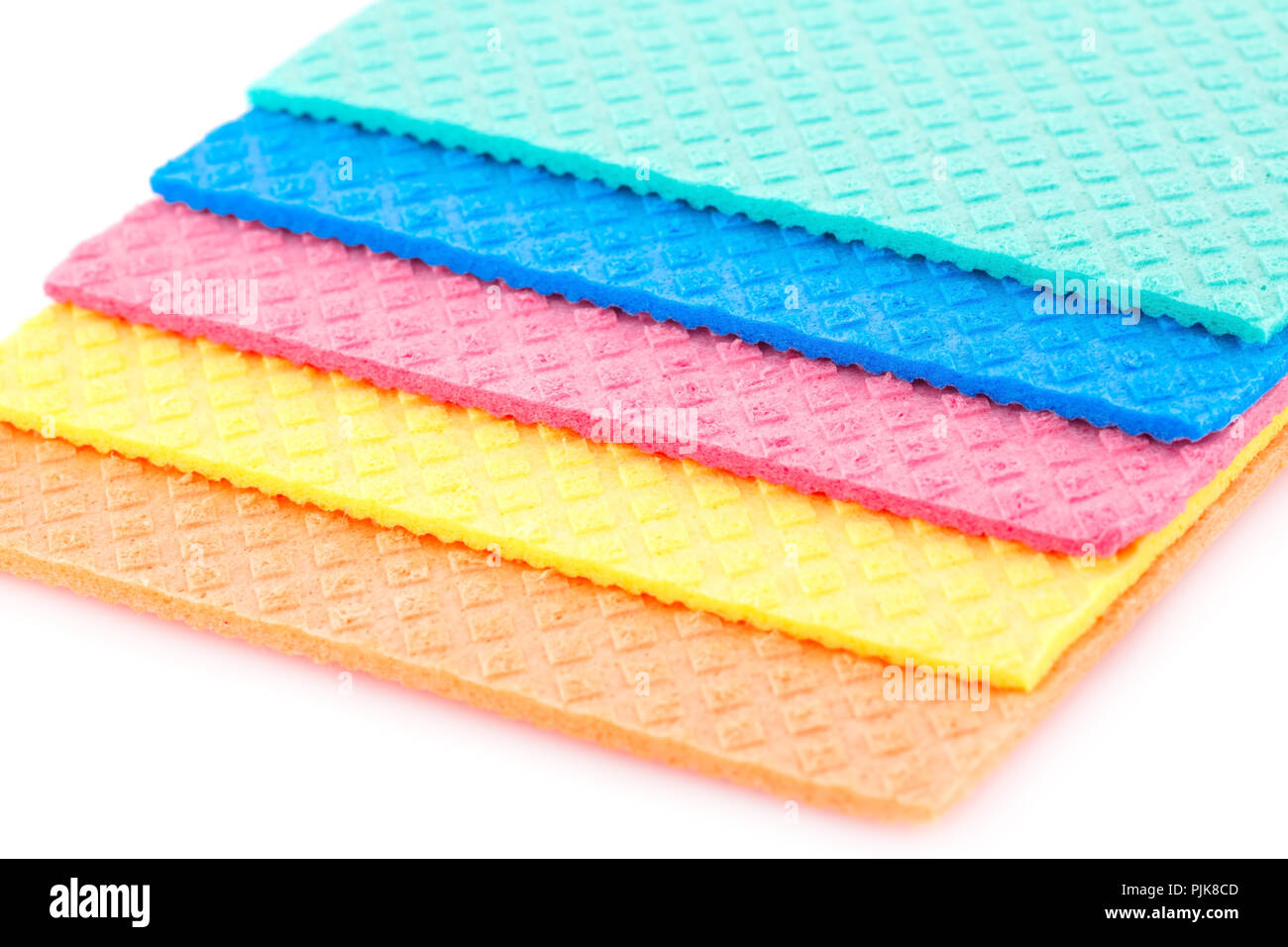 Colorful sponges on white background Stock Photo - Alamy