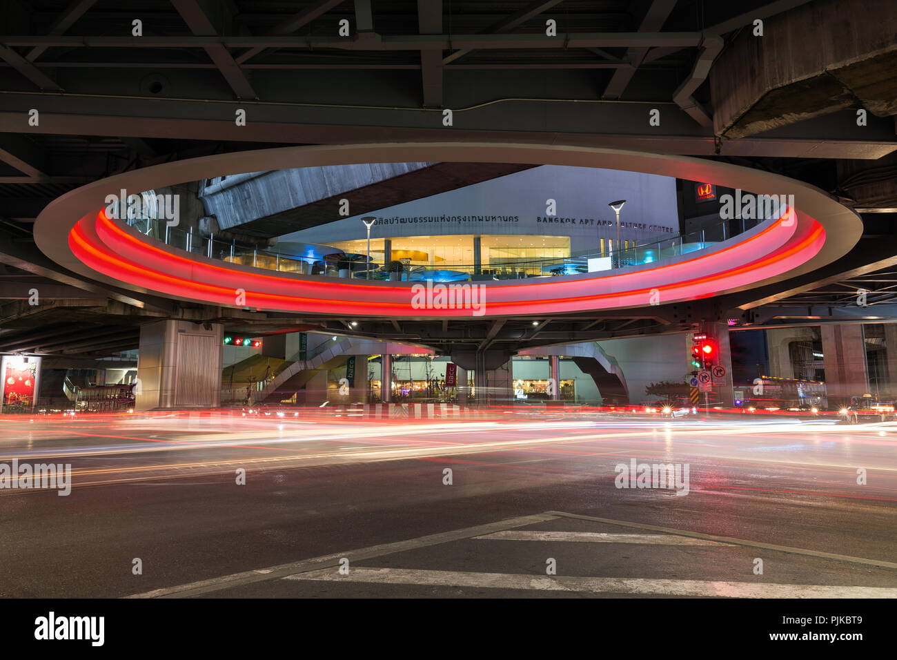 Car light trails at the Pathumwan Junction under MBK Center skywalk ...