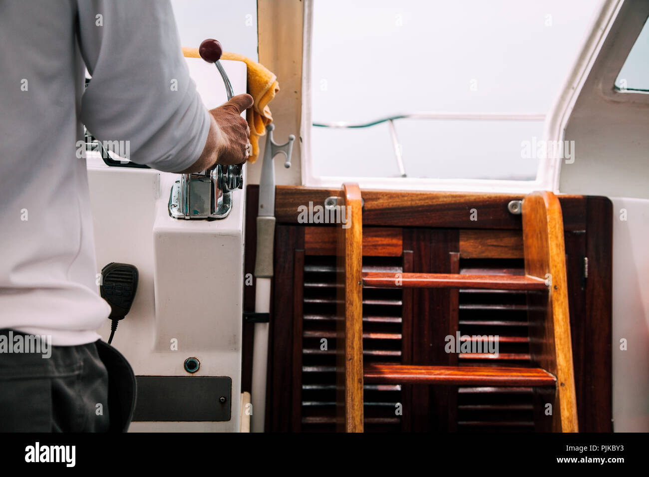 Hands steer boat hi-res stock photography and images - Alamy