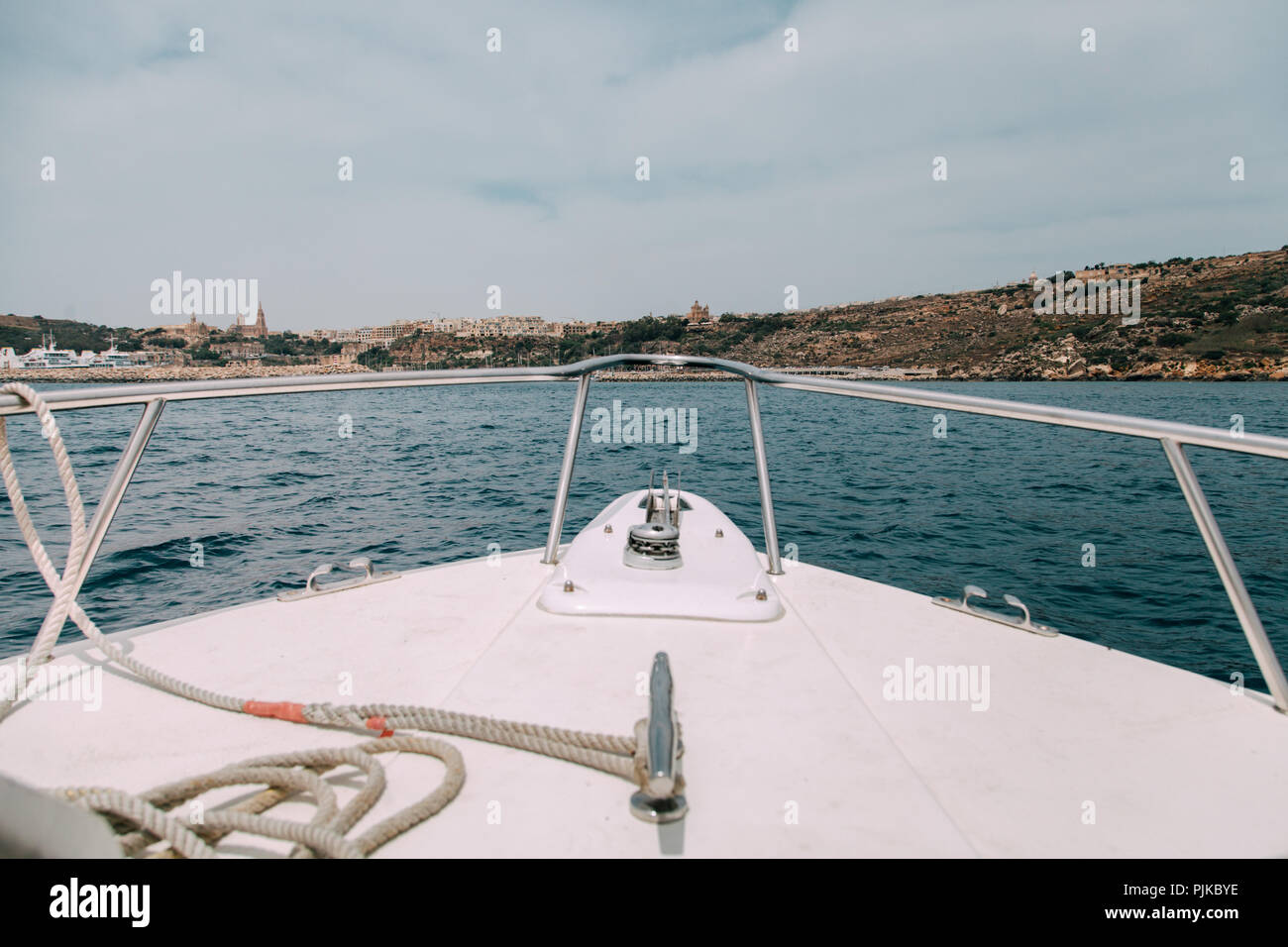 Views of the island from inside a boat whit a rope in the deck Stock ...