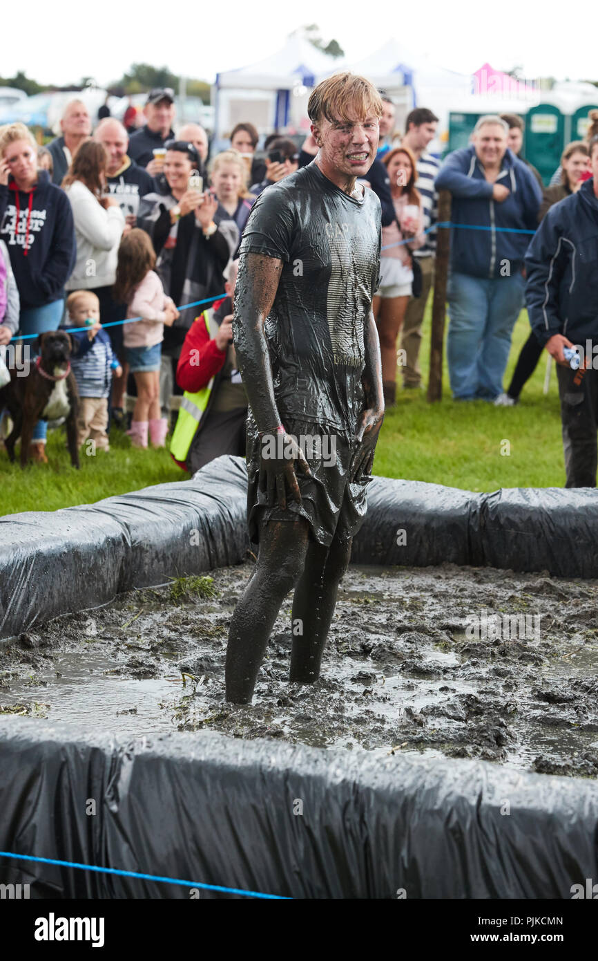 Man covered in black mud hi-res stock photography and images - Alamy