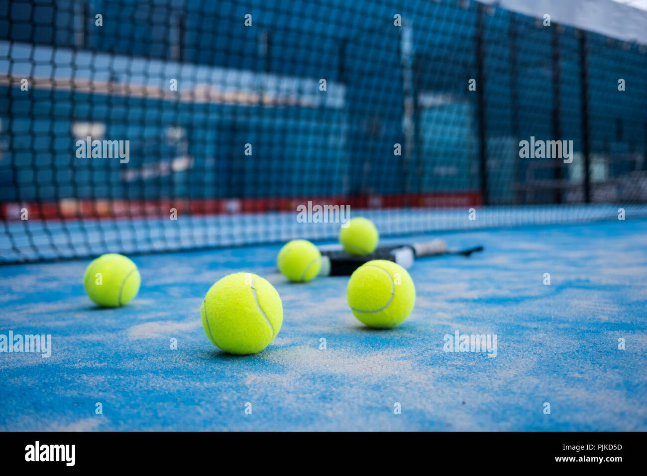 Still life of tennis balls and a racket hi-res stock photography and ...