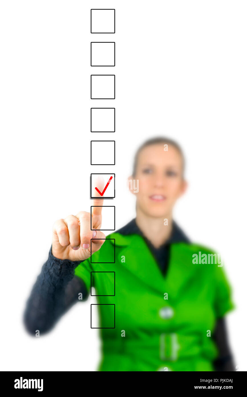 Woman ticking a check box in a vertical line of empty boxes in a survey ...