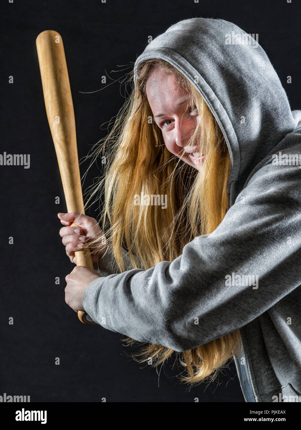 Woman, 21 years, Portrait with baseball bat, Studio shot Stock Photo ...