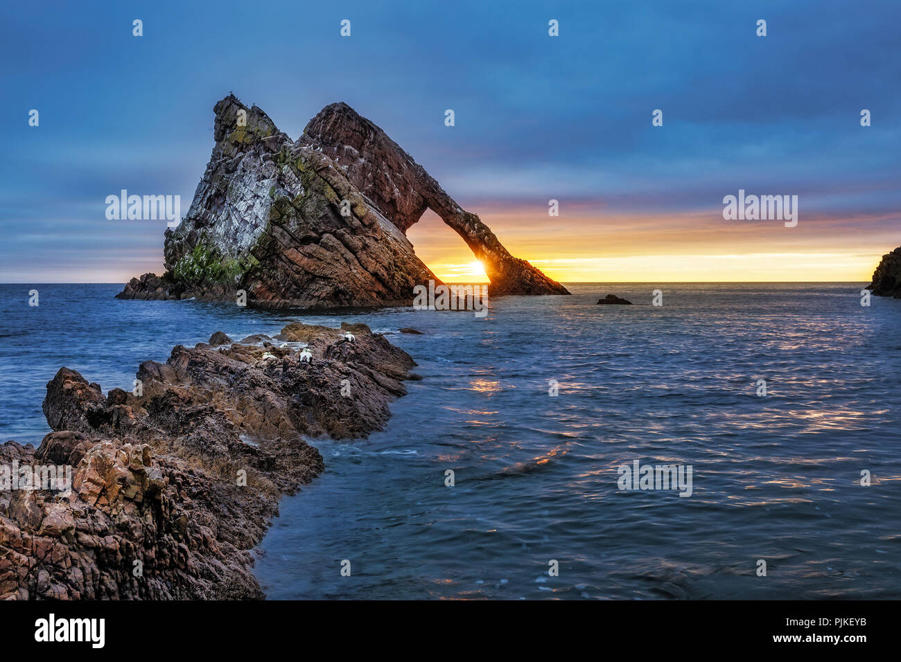 Sunrise at Bow fiddle Rock near Portknockie Stock Photo - Alamy