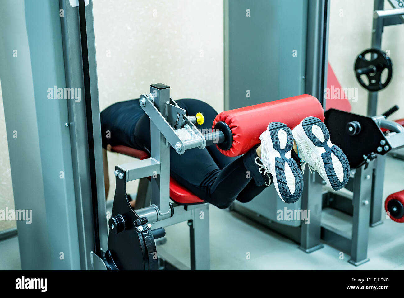 Woman lie back lifting leg hi-res stock photography and images - Alamy