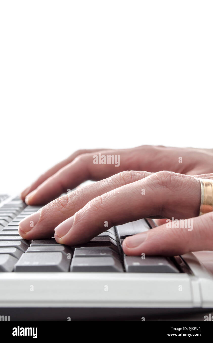 Typing hands on keyboard isolated over white background Stock Photo - Alamy