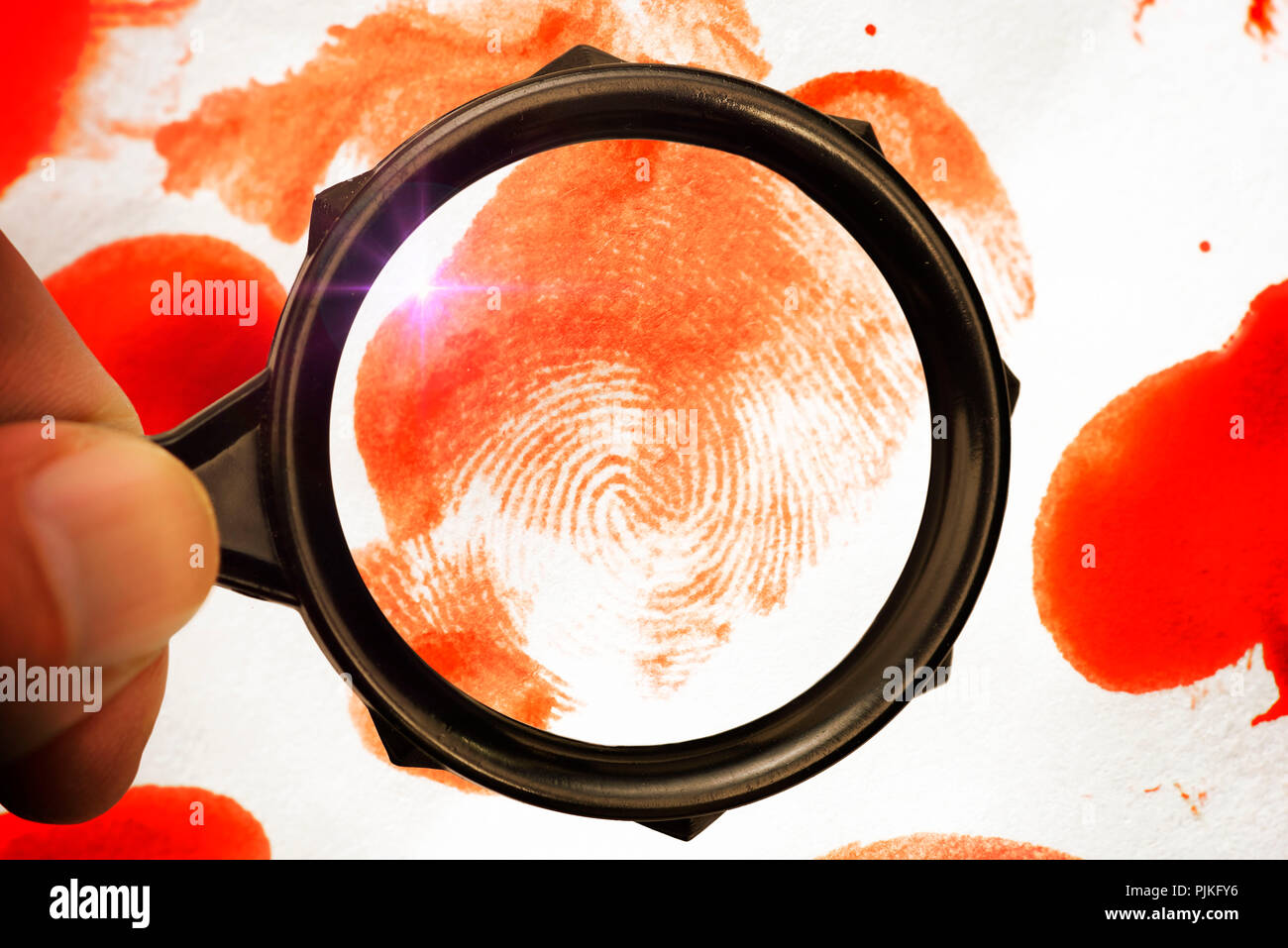 Drop of blood, fingerprint, magnifying glass, forensics Stock Photo - Alamy