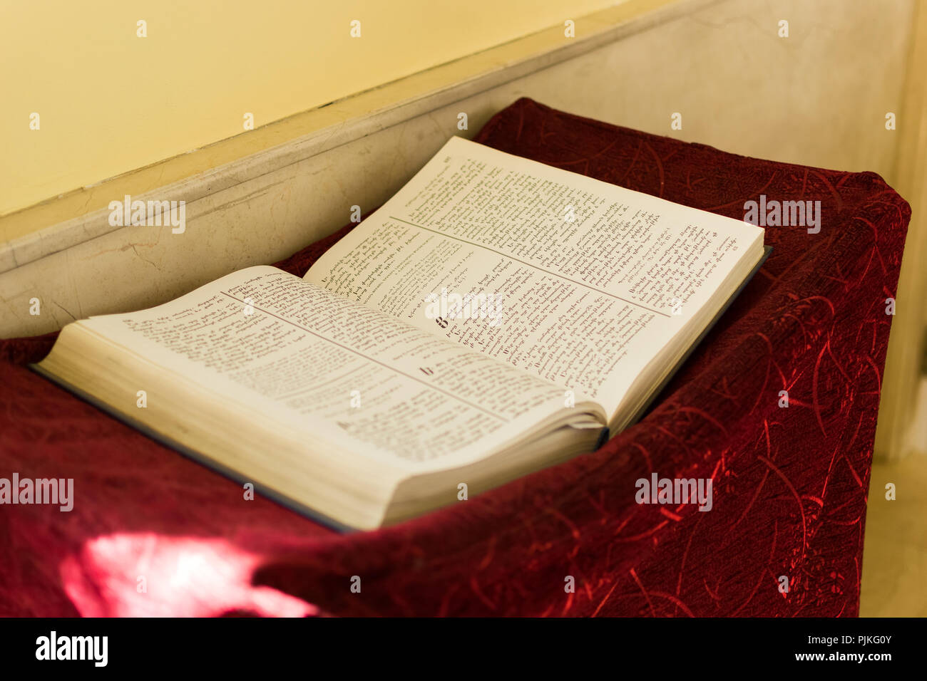 ancient old Testament book lies on the altar Stock Photo - Alamy