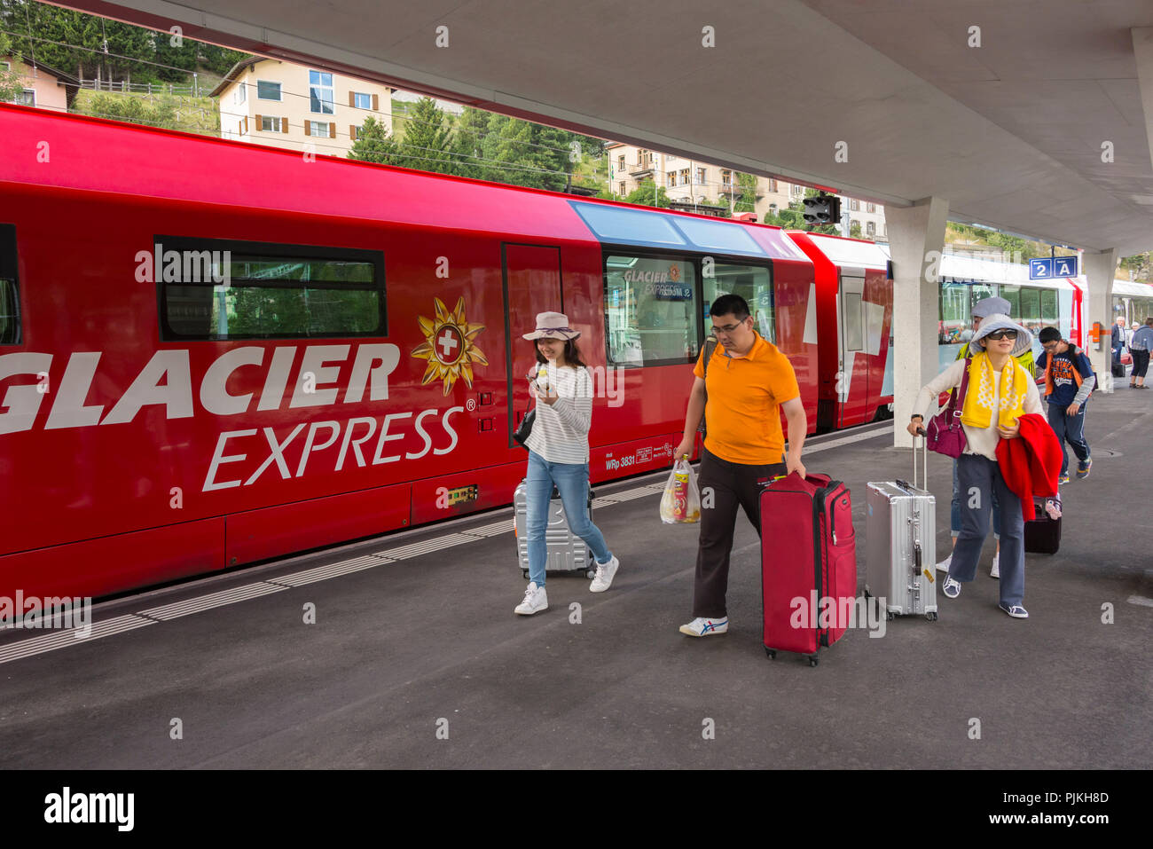 Glacier Express in the train station St. Moritz, Rhaetian Railway ...