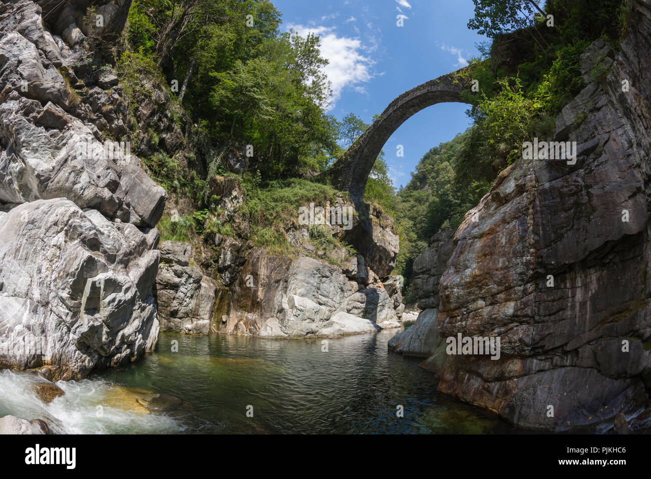 Roman bridge Ponte Romano over river Melezza, near Intragna, Centovalli ...