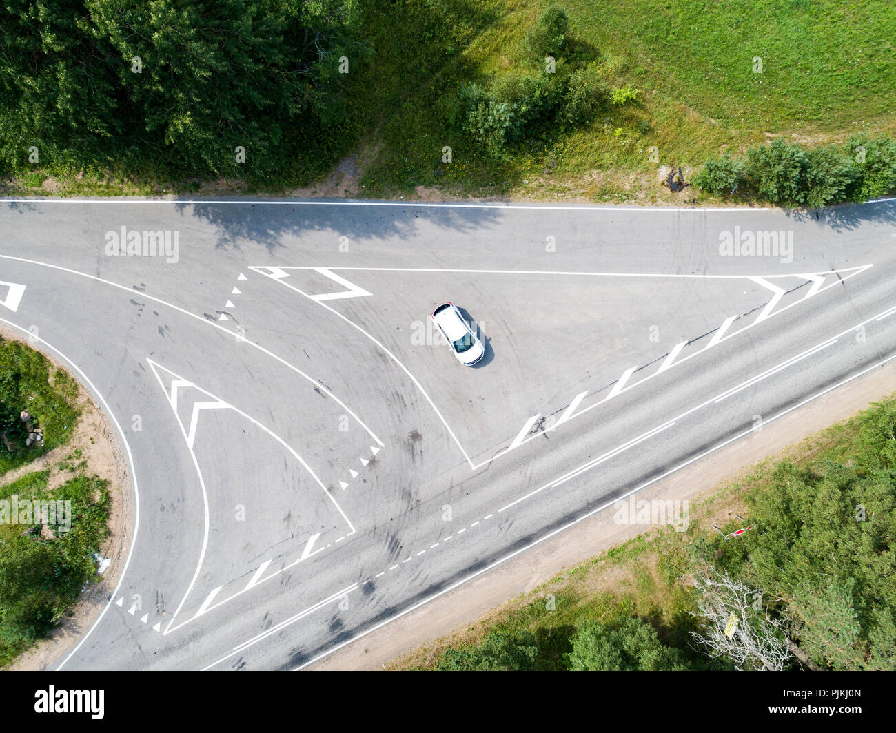 Aerial view of highway. Aerial view of a country road with moving car ...