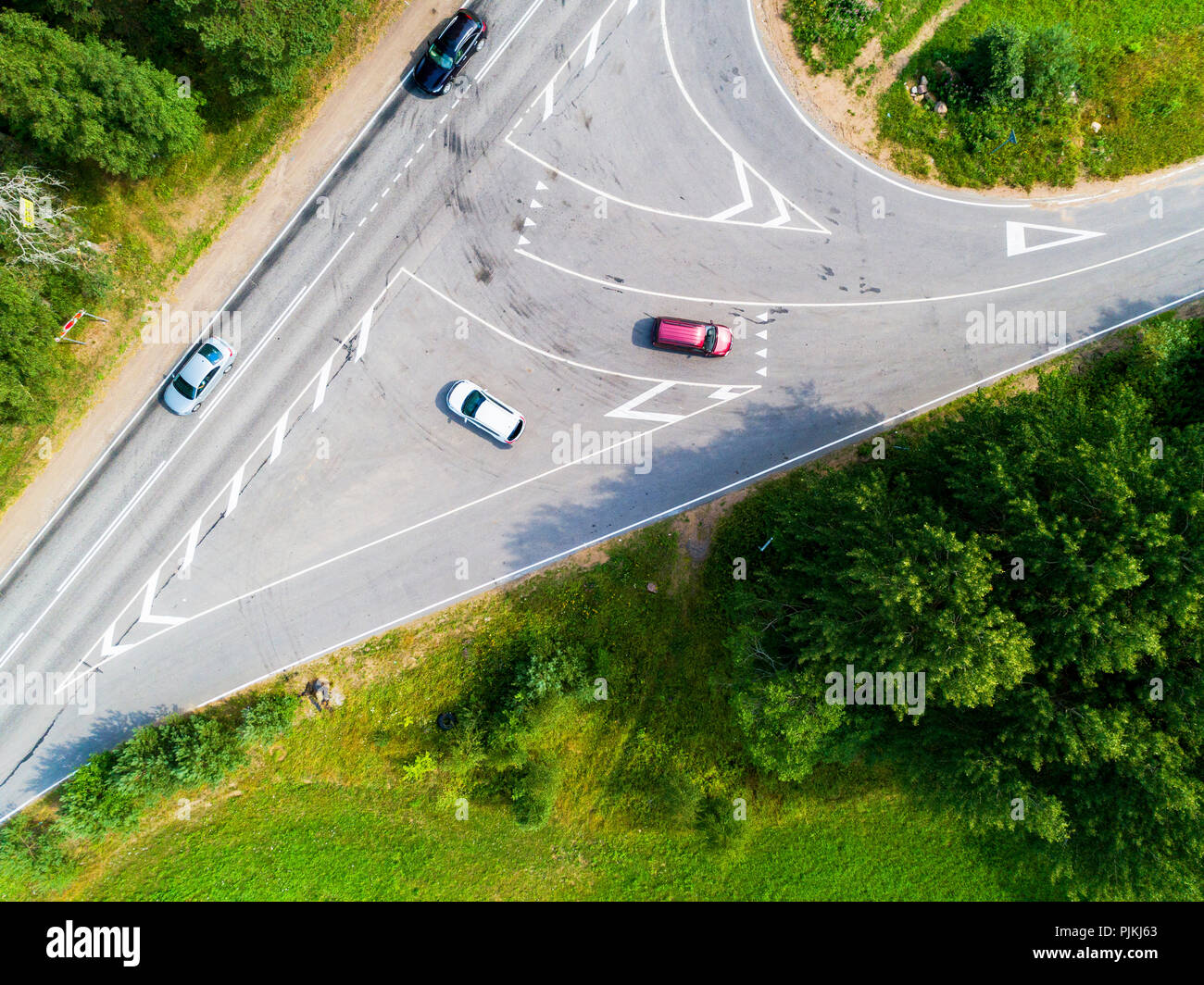 Aerial view of highway with car. Aerial view of a country road with ...