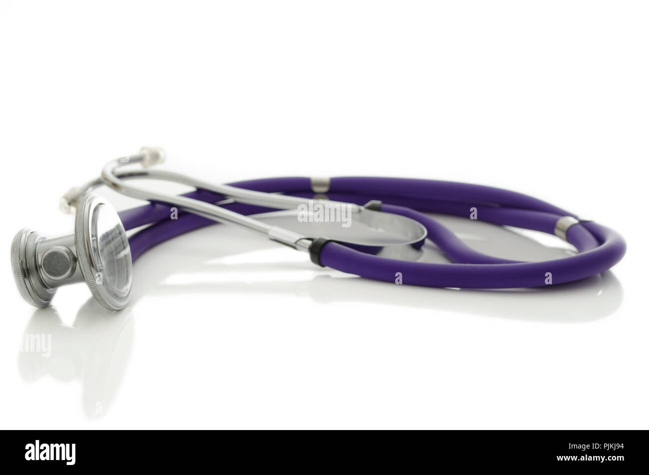 Purple stethoscope isolated on a white background Stock Photo - Alamy