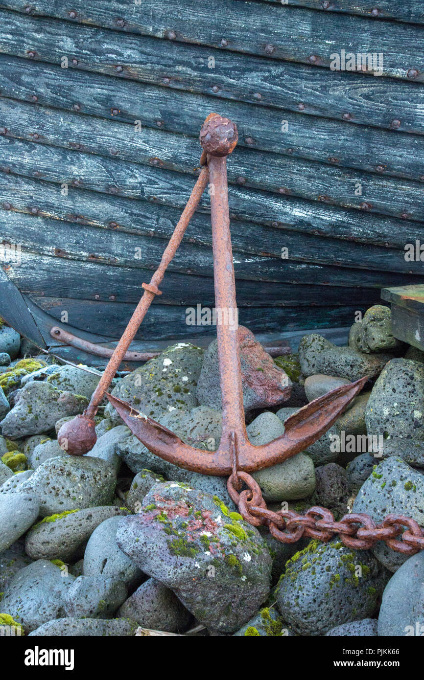 Old rusty anchor in front of boat hull hi-res stock photography and ...