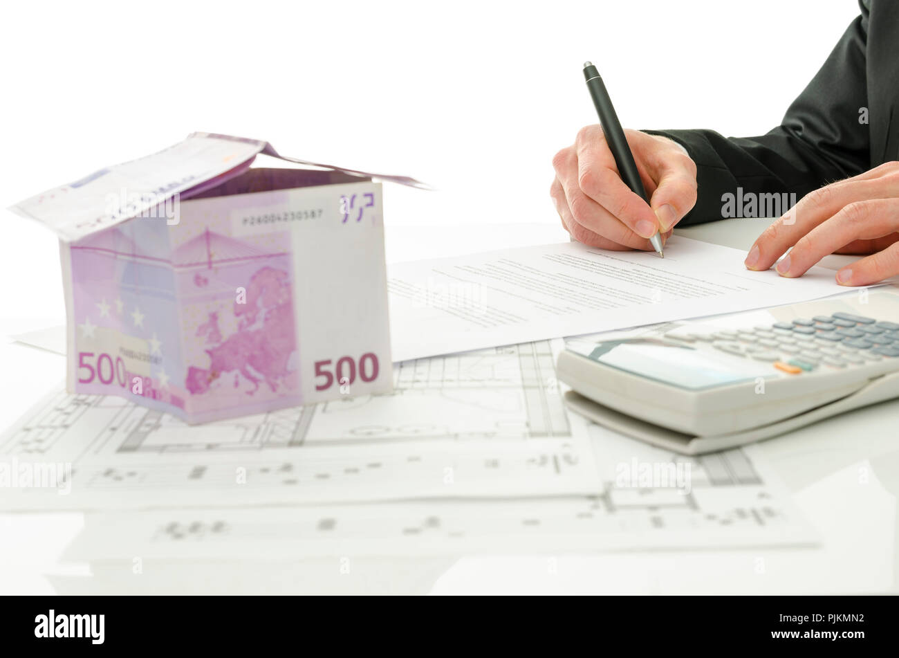 Signing contract of house sale with house made of 500 Euro money and ...