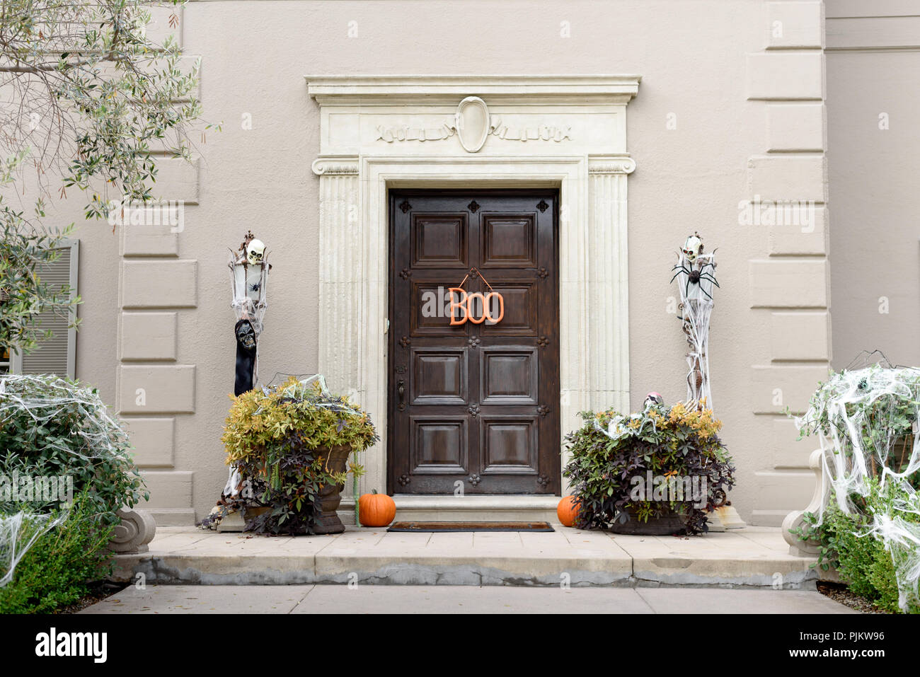 Halloween in front of house decorations Stock Photo - Alamy