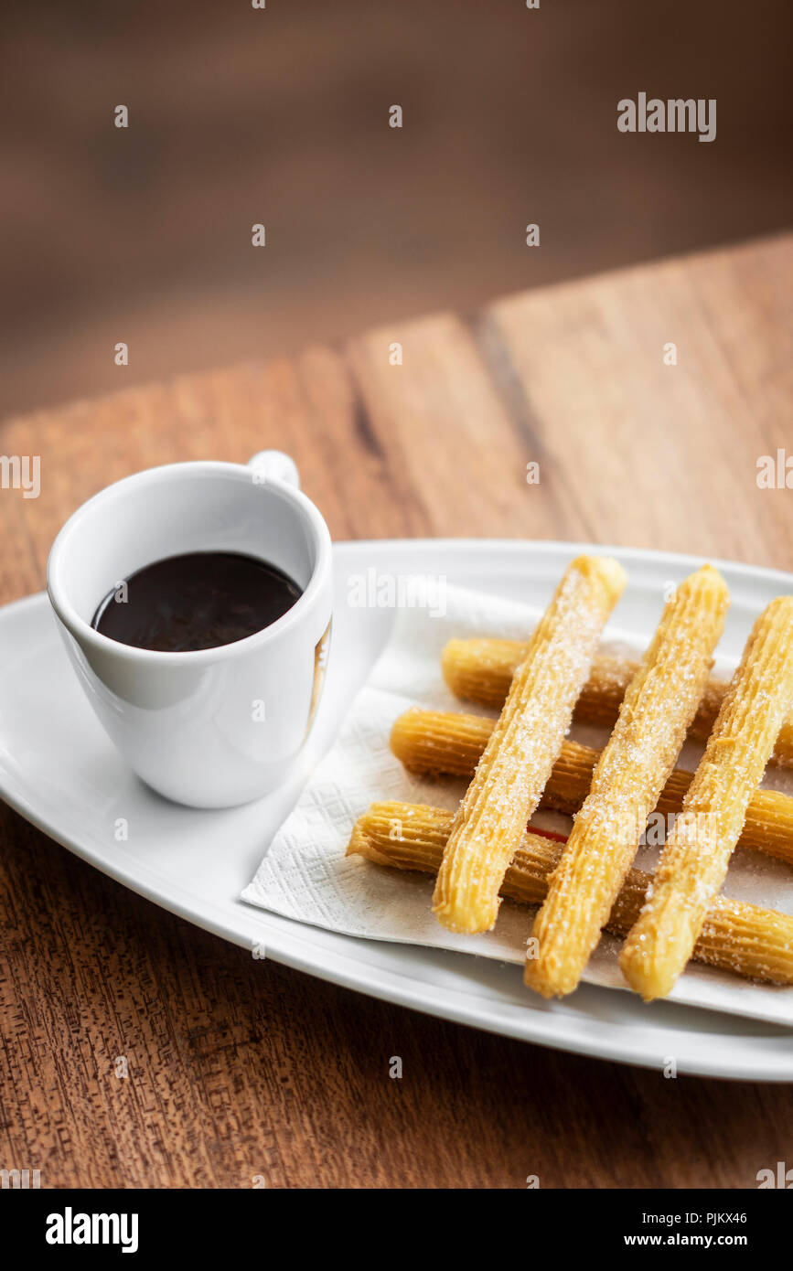 Churros con chocolate hi-res stock photography and images - Alamy